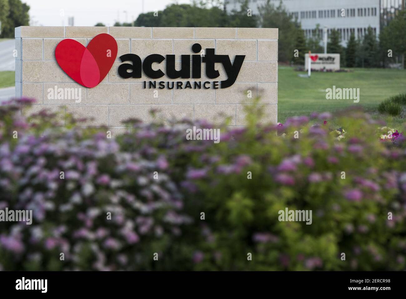 A logo sign outside of the headquarters of Acuity Insurance in ...