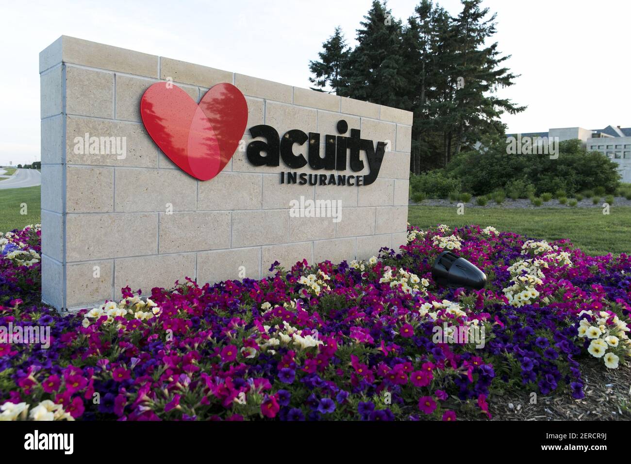 A logo sign outside of the headquarters of Acuity Insurance in ...