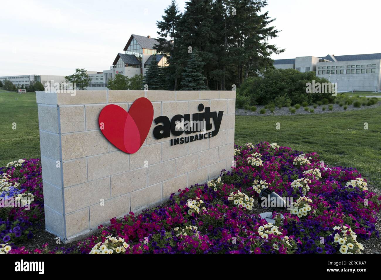 A logo sign outside of the headquarters of Acuity Insurance in ...