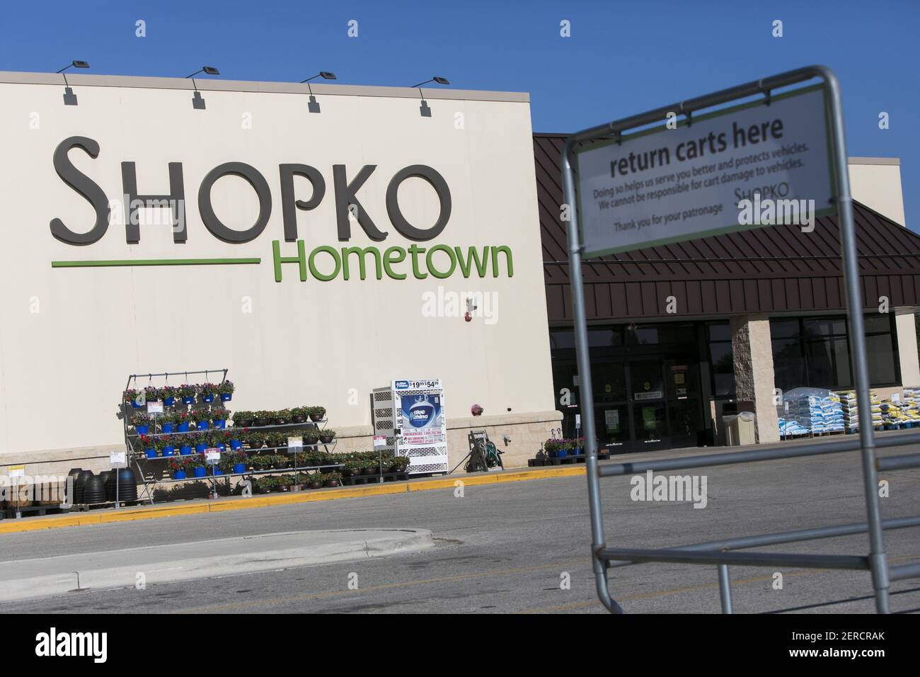A logo sign outside of a Shopko Hometown retail store in Kiel ...