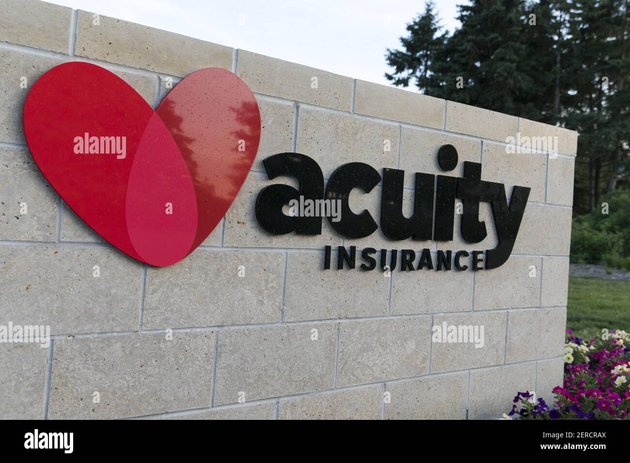 A logo sign outside of the headquarters of Acuity Insurance in ...