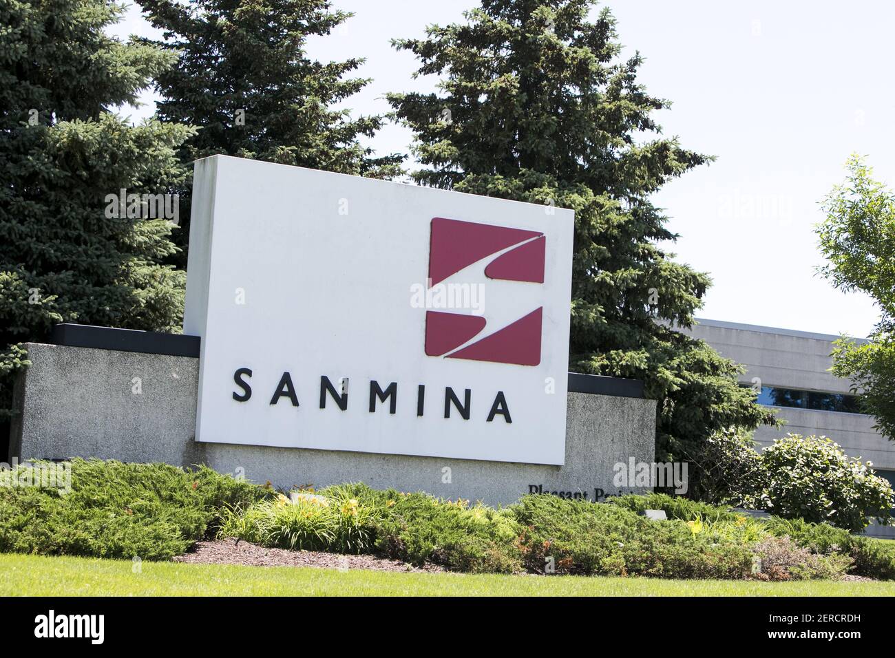 A logo sign outside of a facility occupied by the Sanmina Corporation ...
