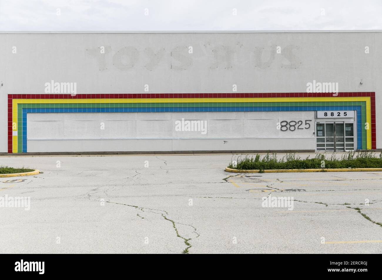 The outline of a Toys-R-Us logo sign is seen on an abandoned former ...