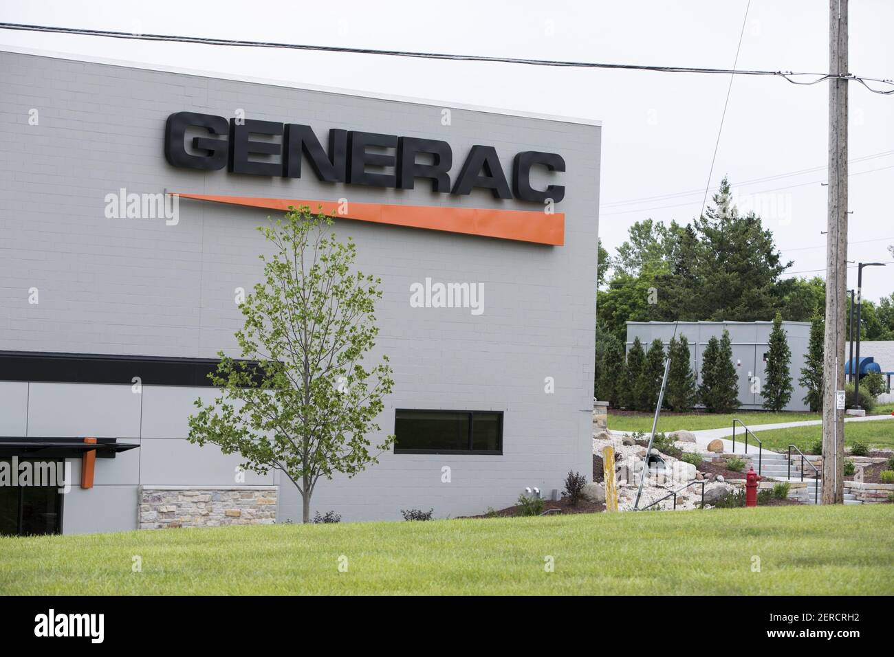 A logo sign outside of the headquarters of Generac Power Systems in ...