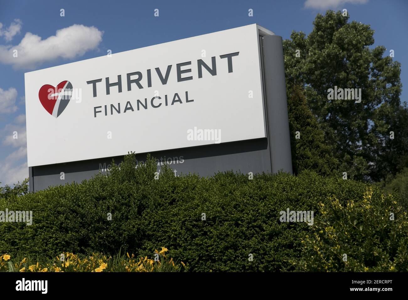 A logo sign outside of the headquarters of Thrivent Financial in ...