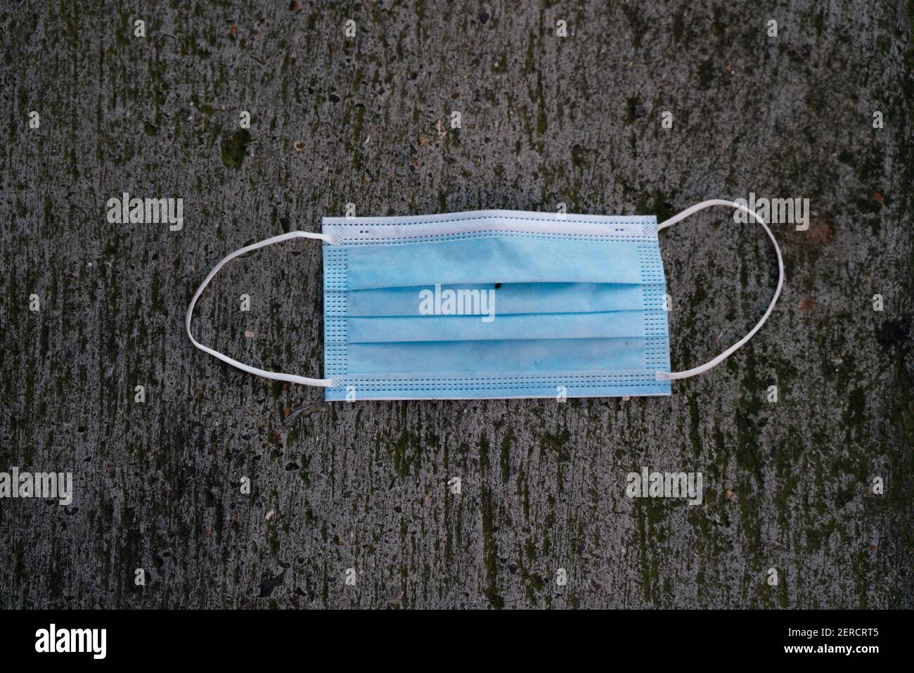 disposable face mask littered on the pavement street of london Stock ...
