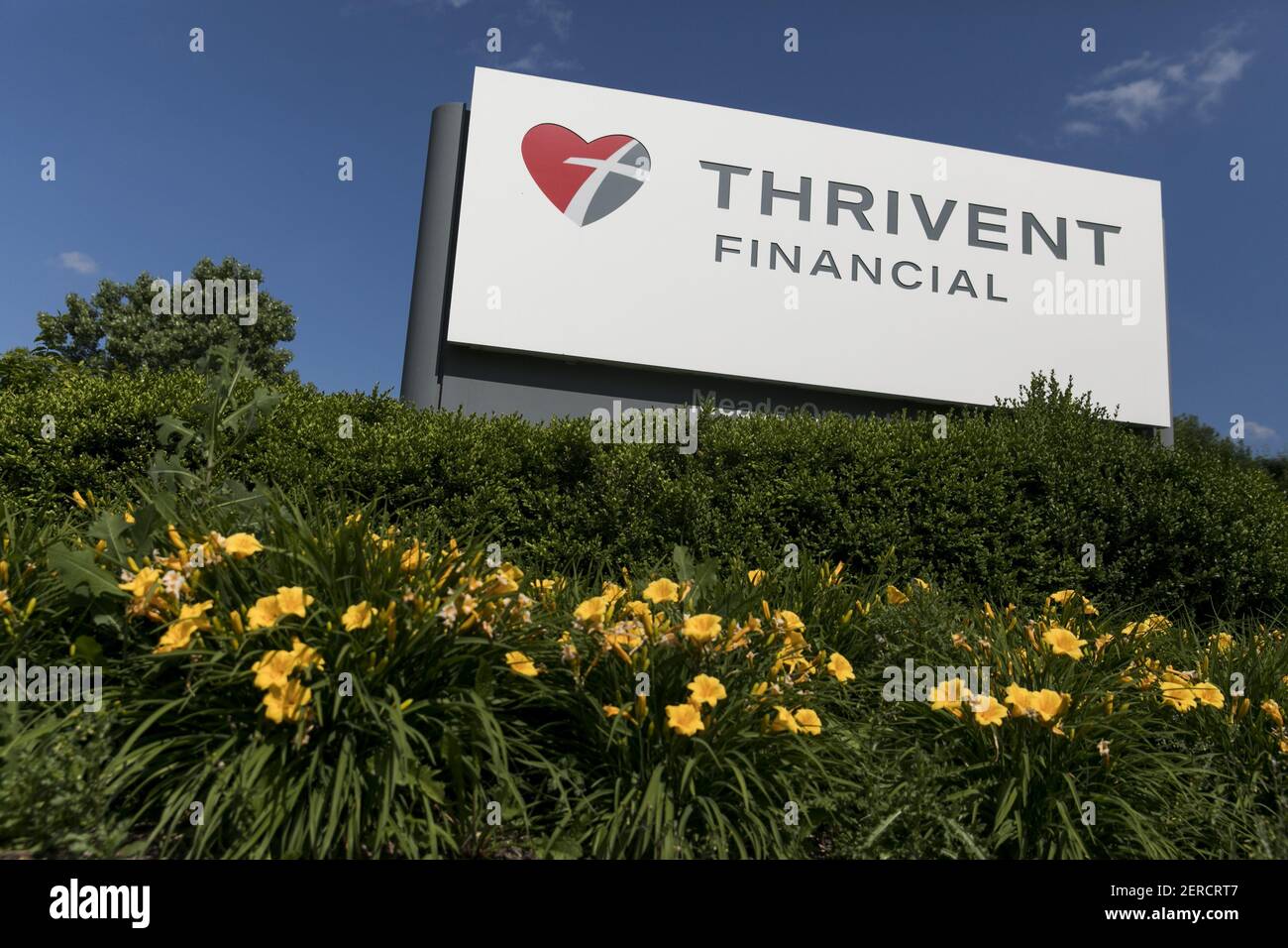 A logo sign outside of the headquarters of Thrivent Financial in ...