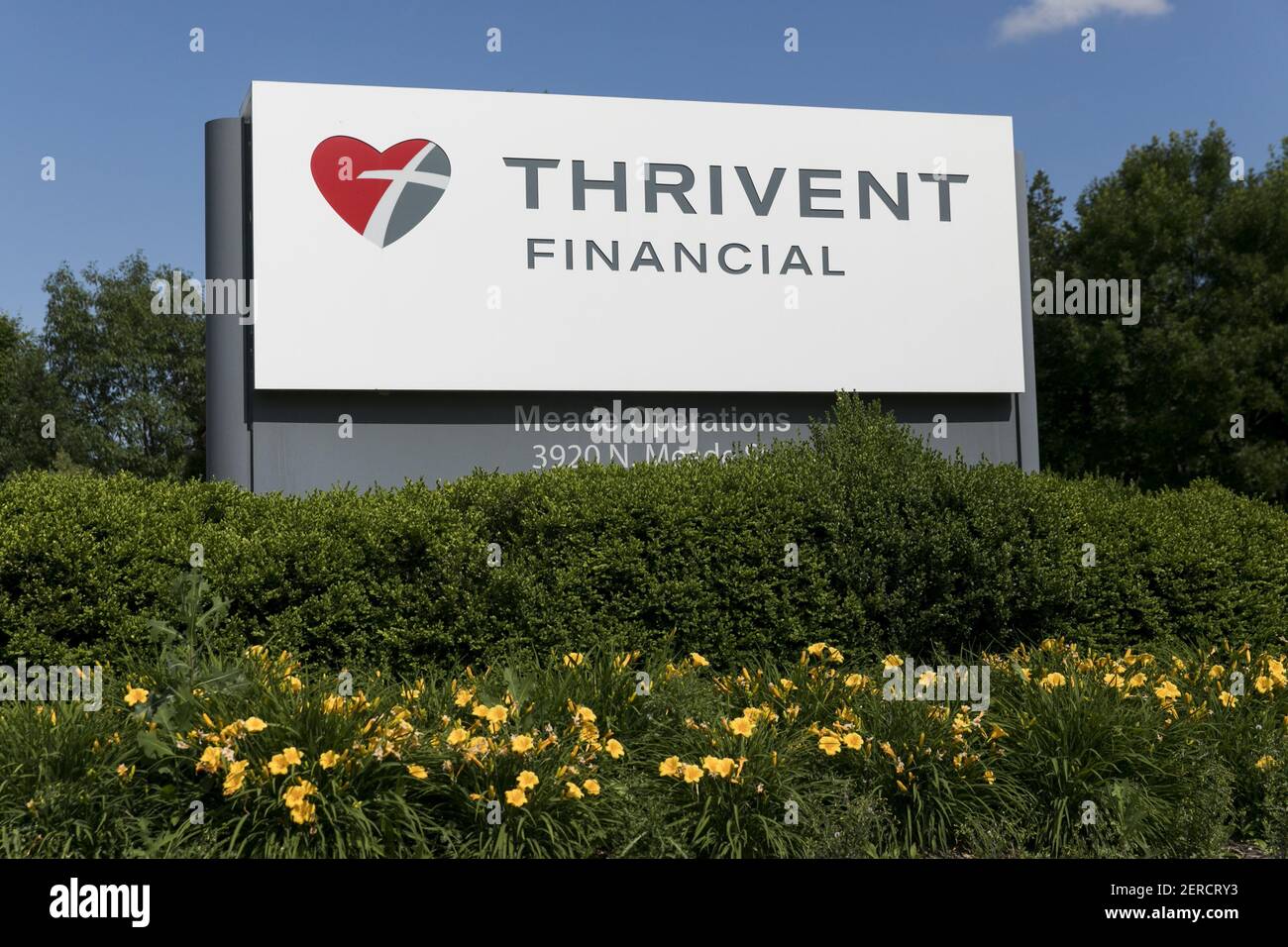 A logo sign outside of the headquarters of Thrivent Financial in ...