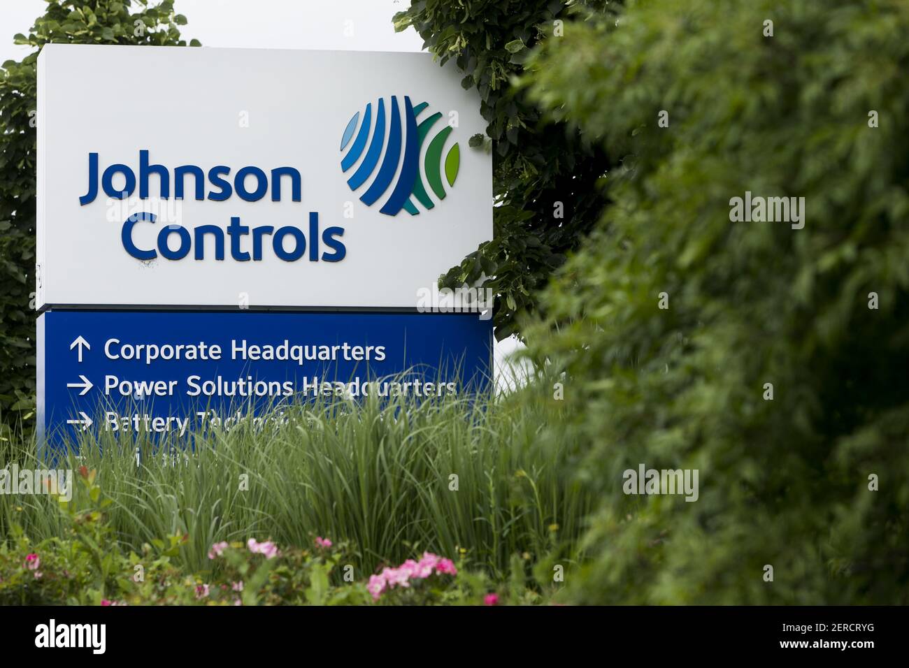 A logo sign outside of the headquarters of Johnson Controls in ...