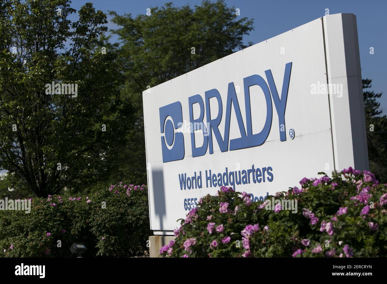 A logo sign outside of the headquarters of the Brady Corporation in ...