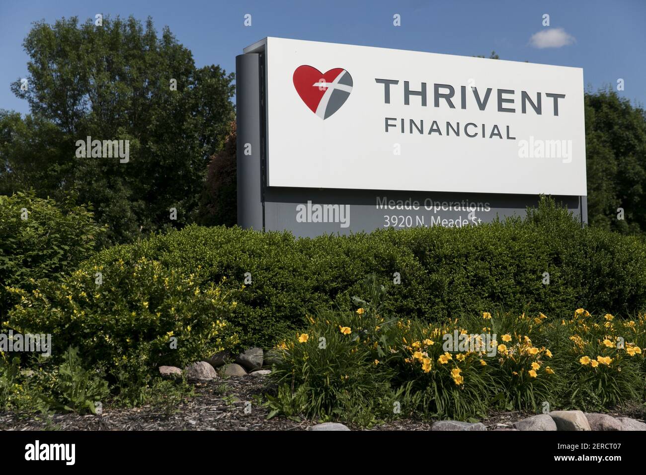 A logo sign outside of the headquarters of Thrivent Financial in ...