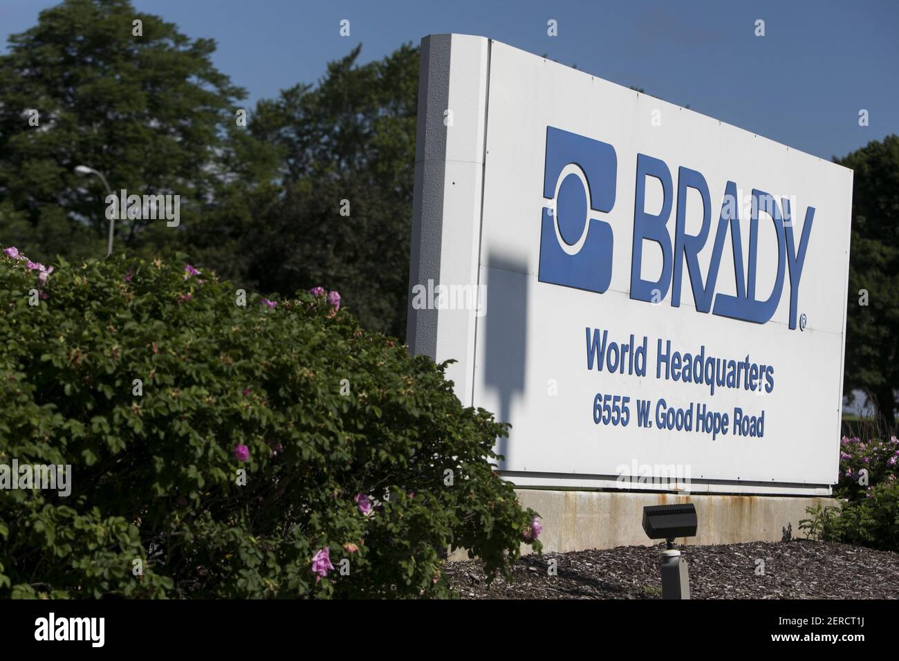 A logo sign outside of the headquarters of the Brady Corporation in ...