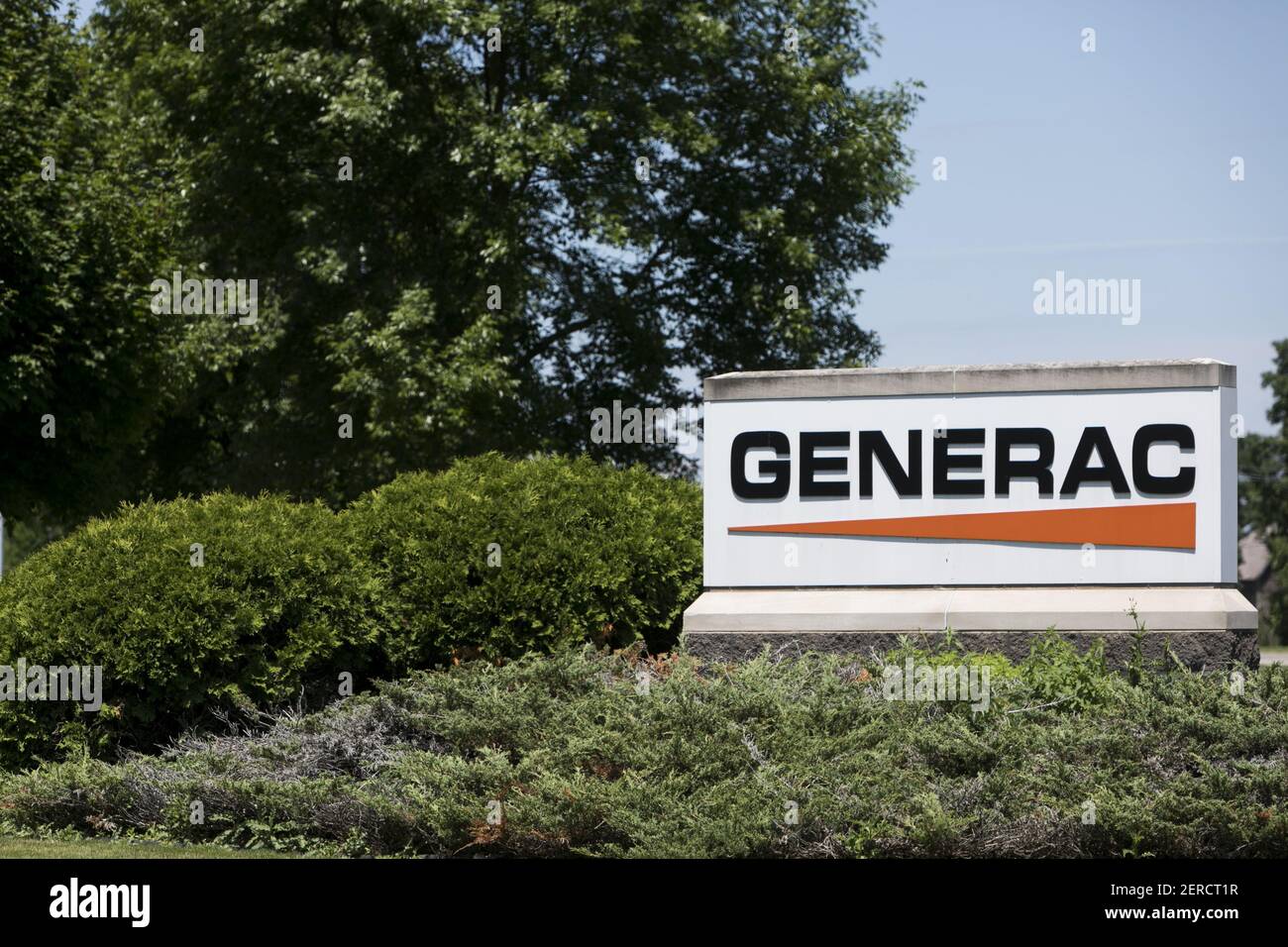 A logo sign outside of a facility occupied by Generac Power Systems in ...