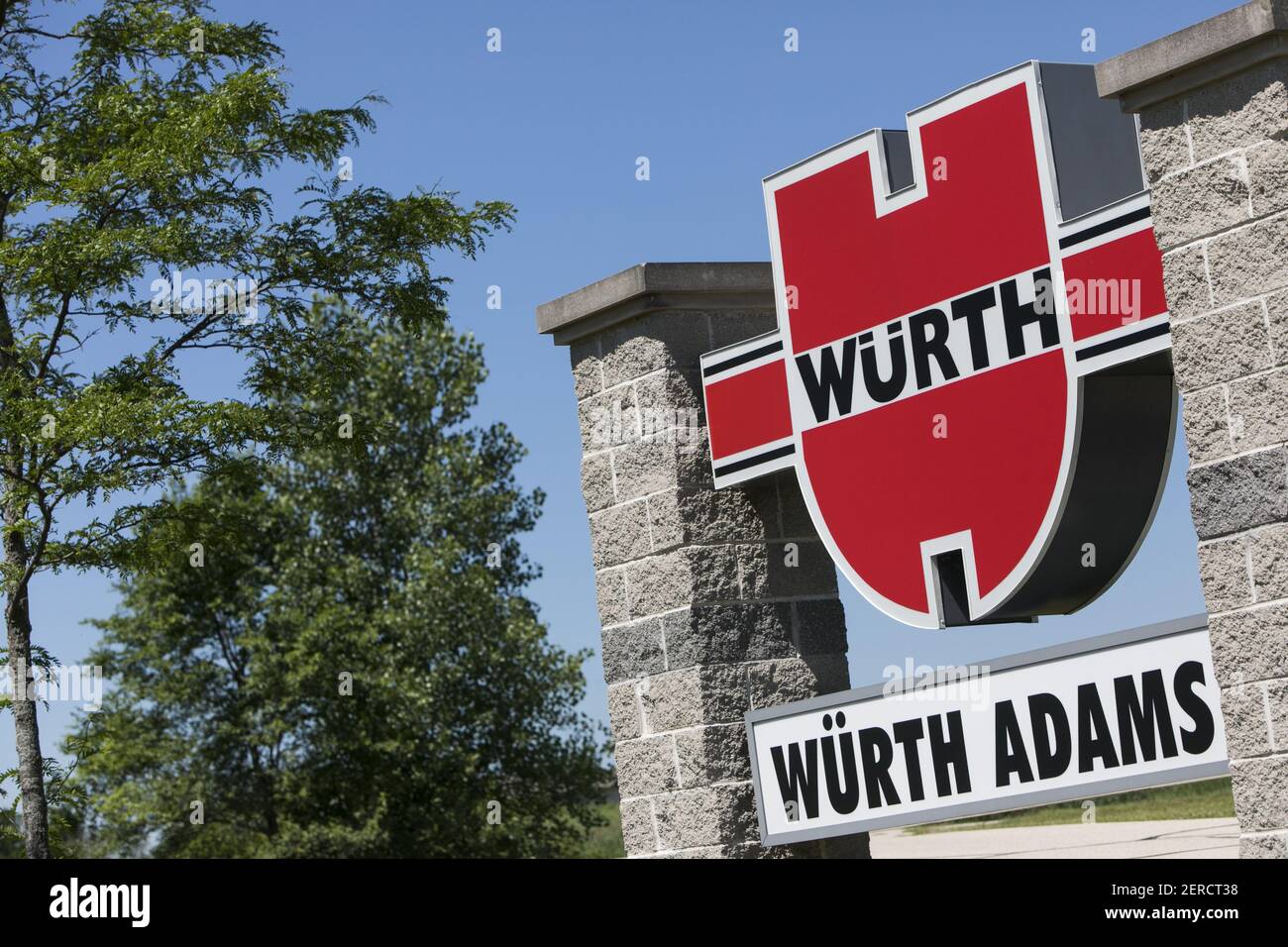 A logo sign outside of a facility occupied by The Würth Group in ...