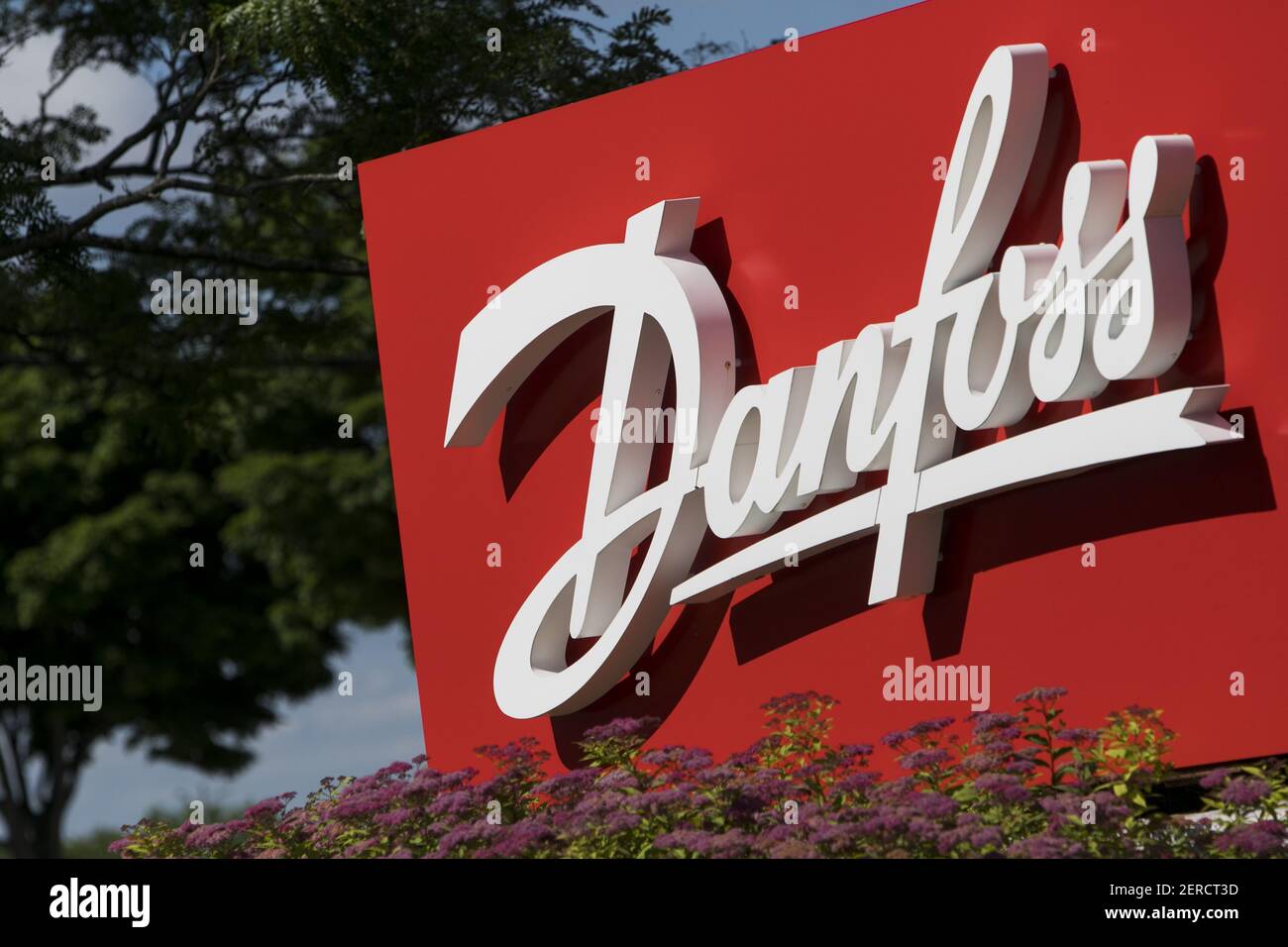 A logo sign outside of a facility occupied by The Danfoss Group in ...