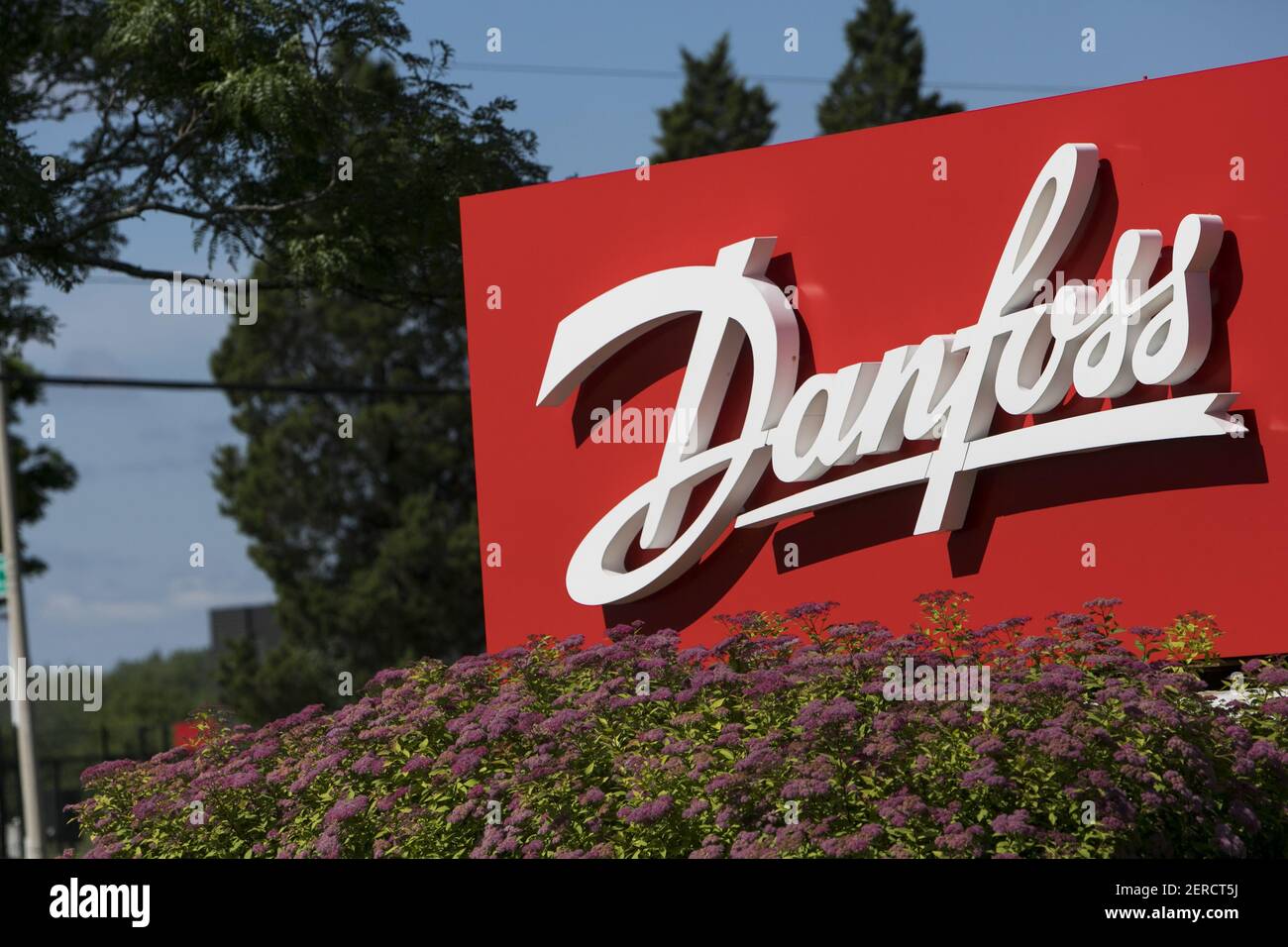 A logo sign outside of a facility occupied by The Danfoss Group in ...