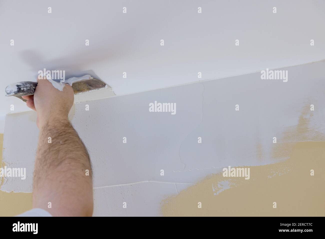 Home interior renovation on coating plastering wall putty plaster on ...