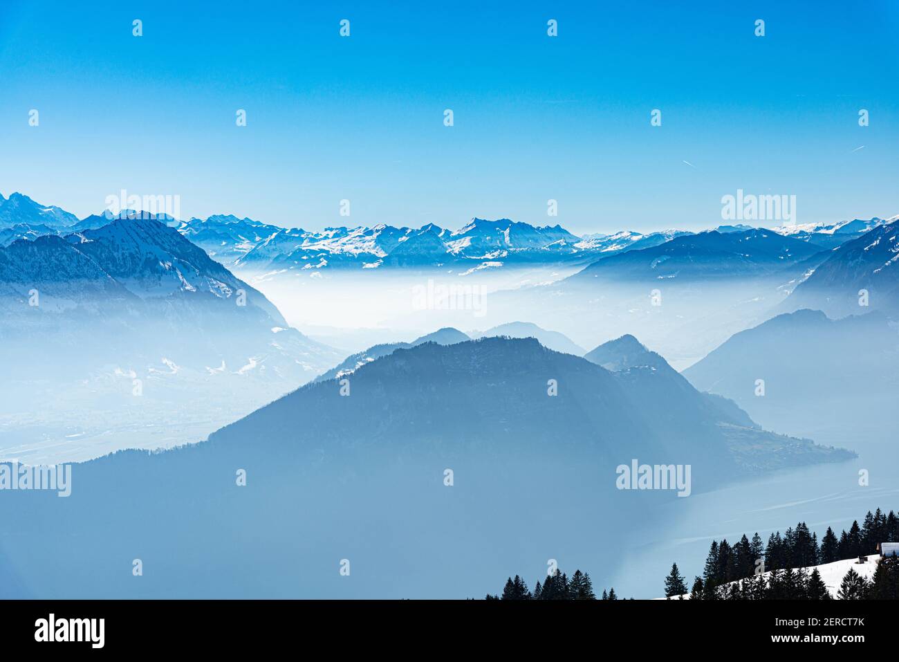 Unique panoramic alpine skyline aerial landscape view of misty iced ...