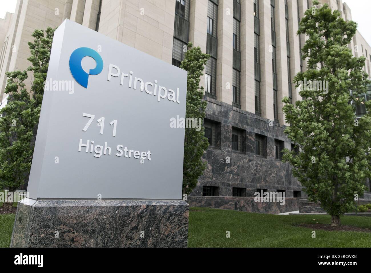 A logo sign outside of the headquarters of The Principal Financial ...