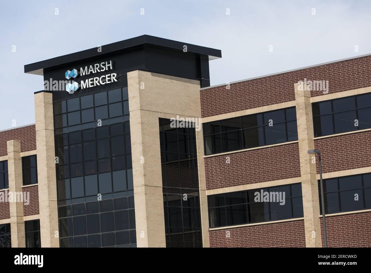 A logo sign outside of a facility occupied by Marsh, LLC and Mercer ...