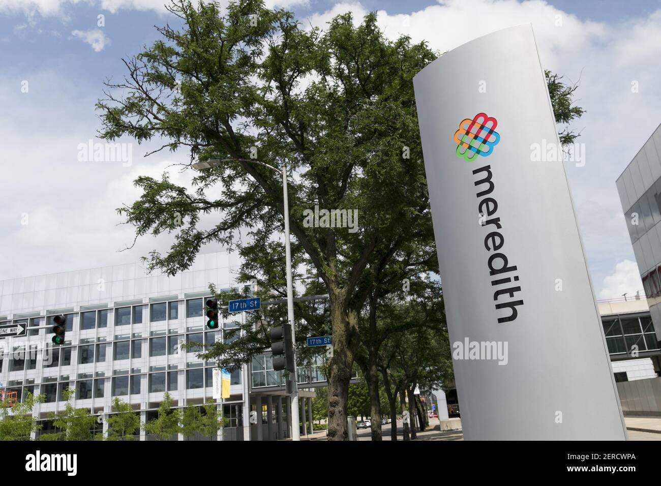 A logo sign outside of the headquarters of the Meredith Corporation in ...
