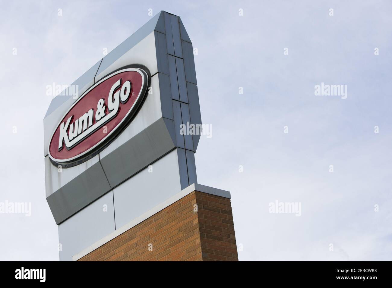 A logo sign outside of the headquarters of Kum & Go in West Des Moines ...