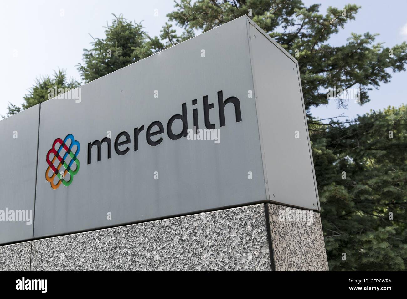 A logo sign outside of the headquarters of the Meredith Corporation in ...