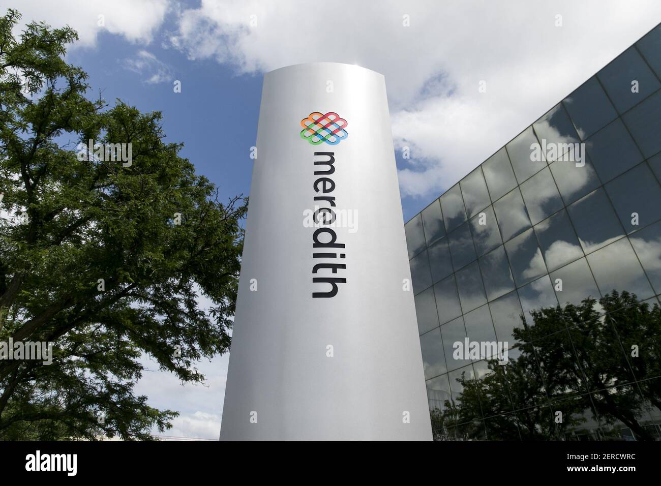 A logo sign outside of the headquarters of the Meredith Corporation in ...