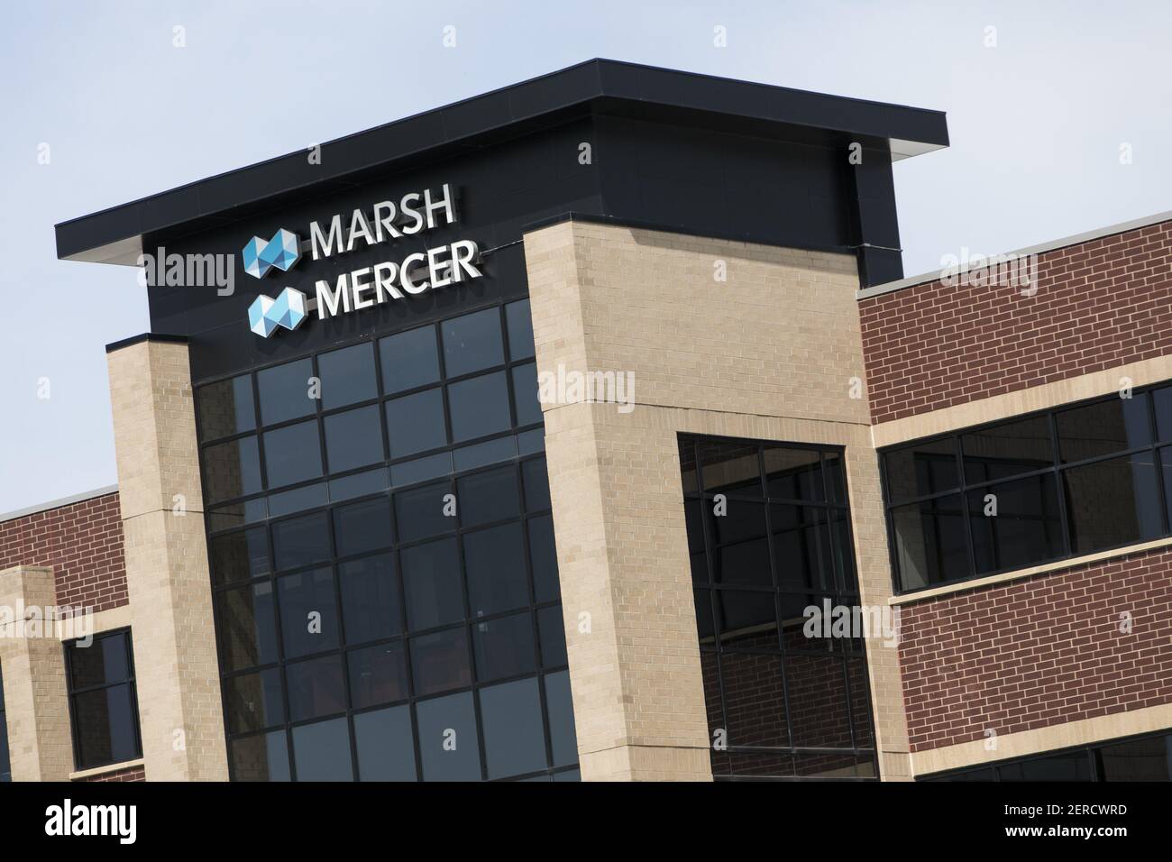 A logo sign outside of a facility occupied by Marsh, LLC and Mercer ...