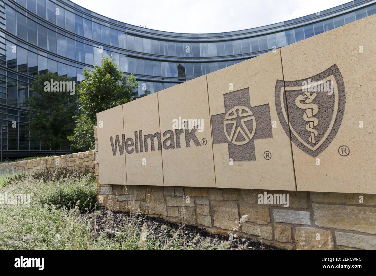 A logo sign outside of the headquarters of Wellmark Blue Cross and Blue ...
