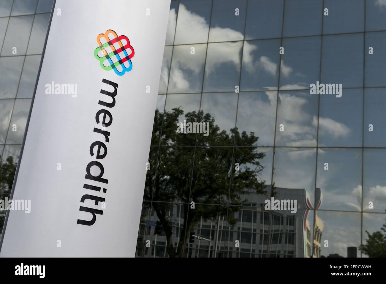A logo sign outside of the headquarters of the Meredith Corporation in ...