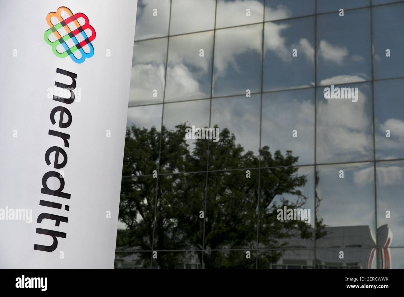 A logo sign outside of the headquarters of the Meredith Corporation in ...