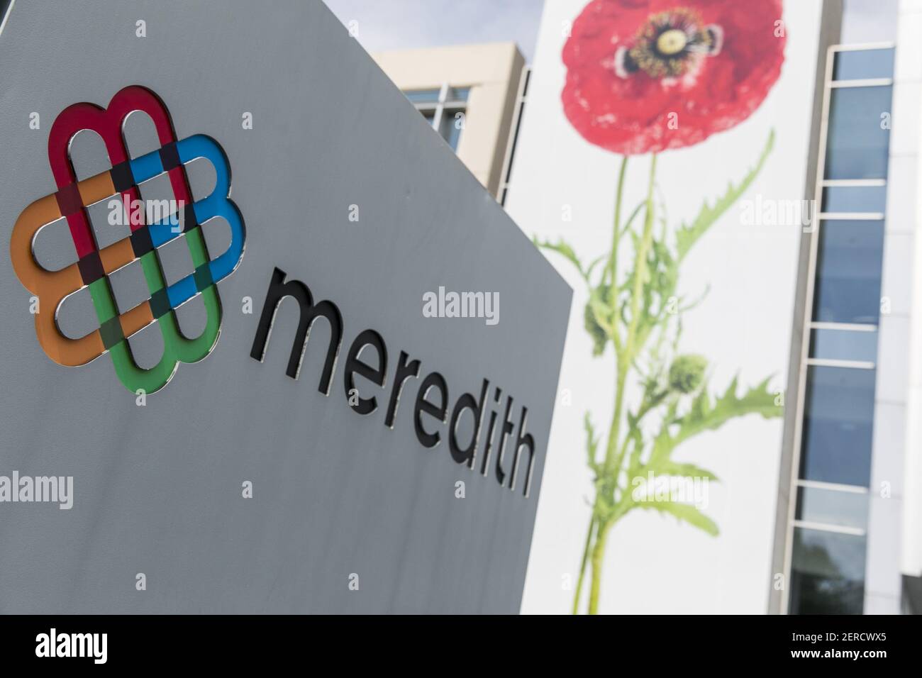 A logo sign outside of the headquarters of the Meredith Corporation in ...