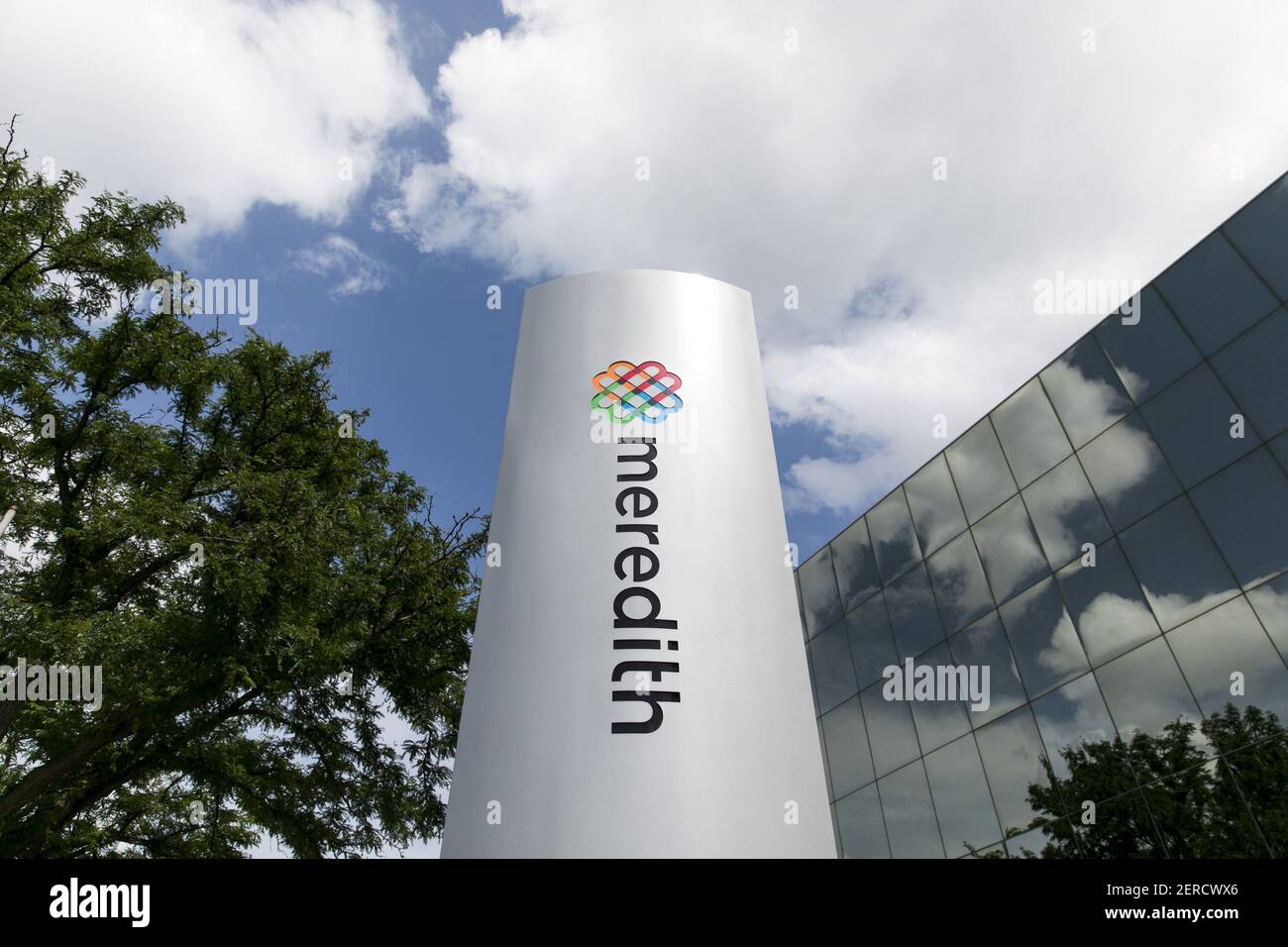 A logo sign outside of the headquarters of the Meredith Corporation in ...