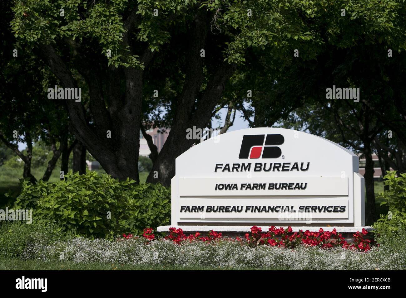 A logo sign outside of the headquarters of the Iowa Farm Bureau ...