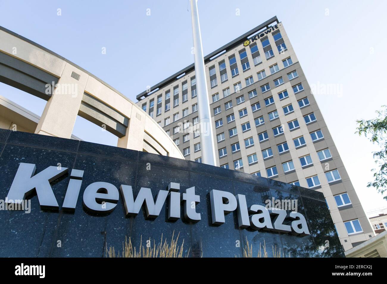 A logo sign outside of Kiewit Plaza, the headquarters of both the ...