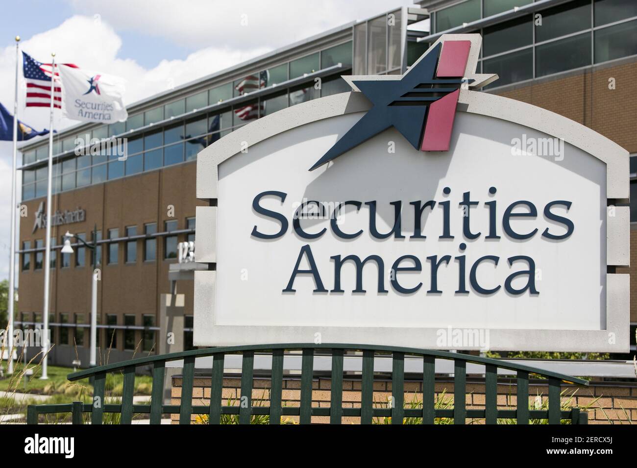 A logo sign outside of the headquarters of Securities America, Inc., in ...