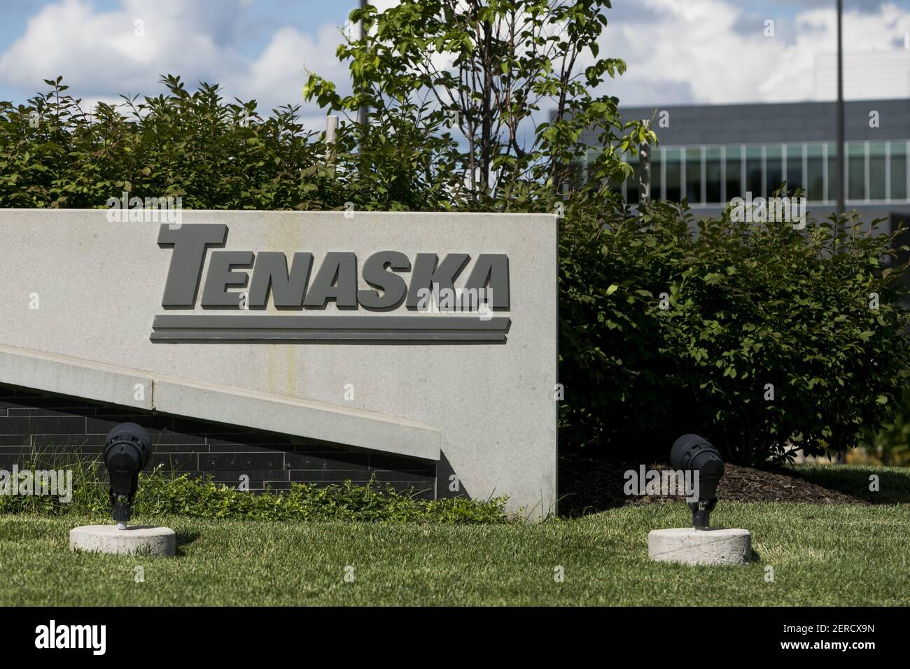 A logo sign outside of the headquarters of Tenaska Energy, Inc., in ...
