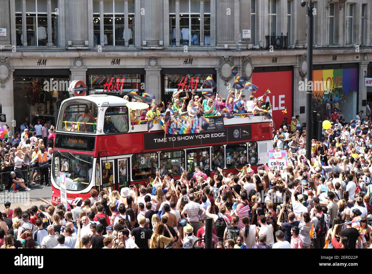 Crowds watch the London Pride parade at Oxford Circus. Over 30,000 ...