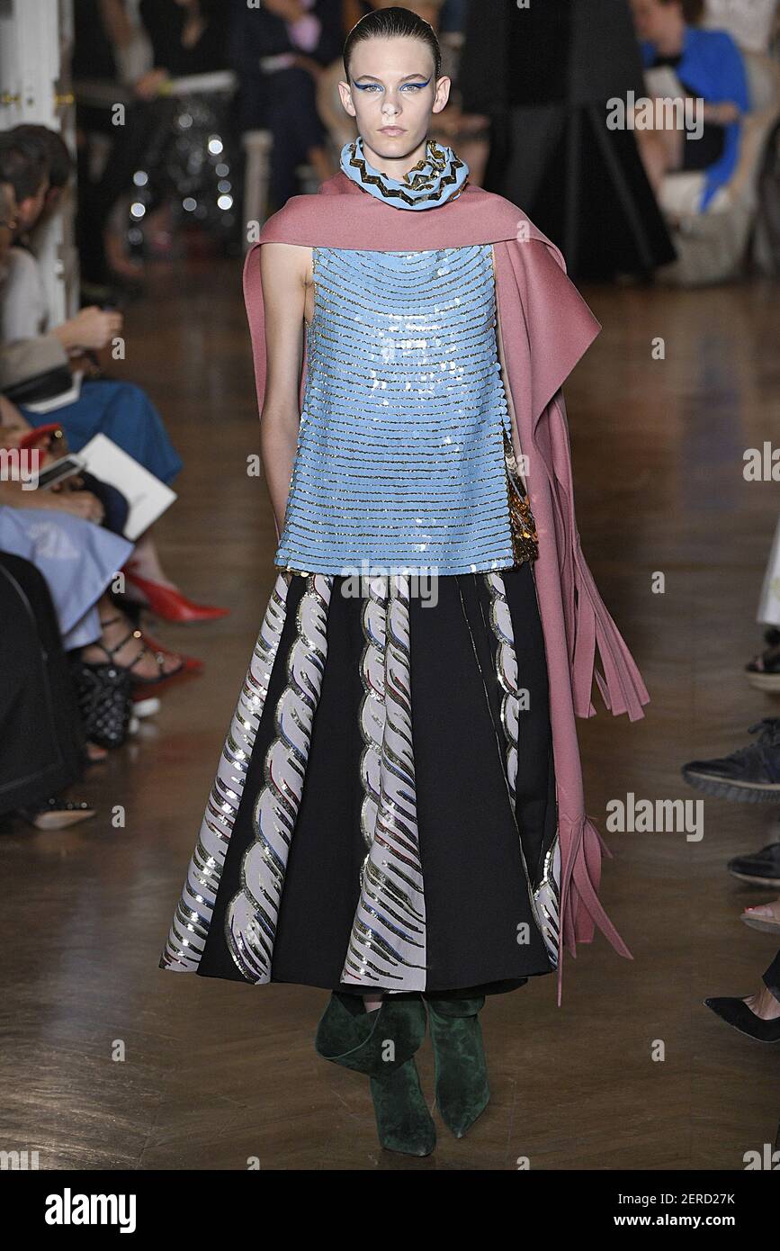 Coline Leclere walks on the runway during the Valentino Haute Couture ...