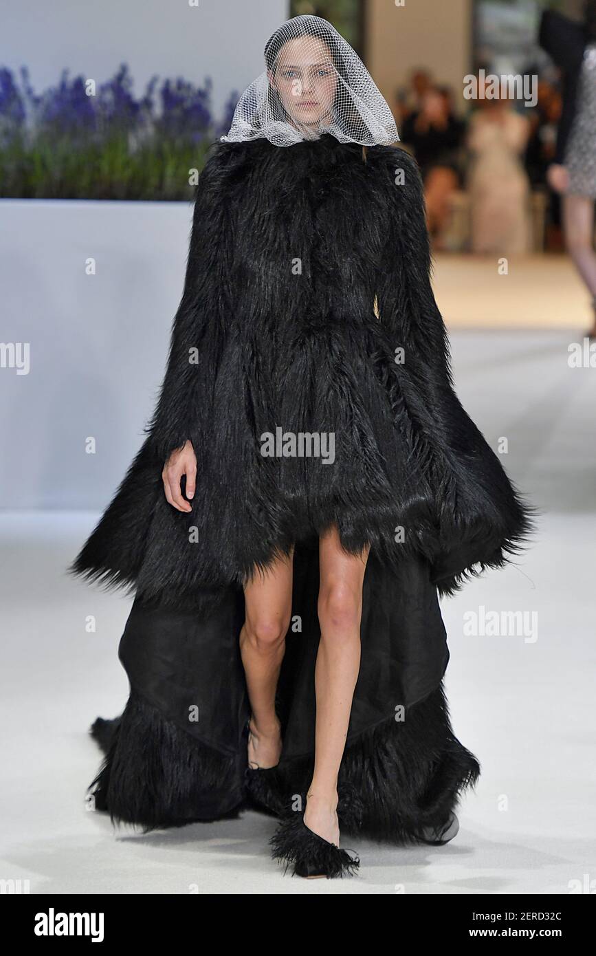 A Model walks on the runway during the Giambattista Valli Haute Couture ...