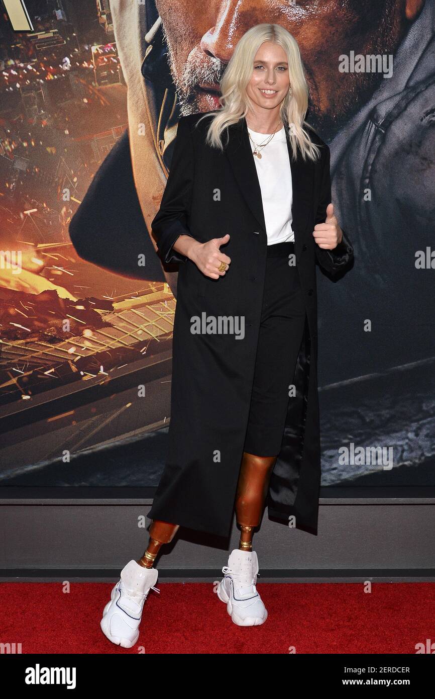 Model Lauren Wasser attends the "Skyscraper" Premiere at the AMC Loews ...