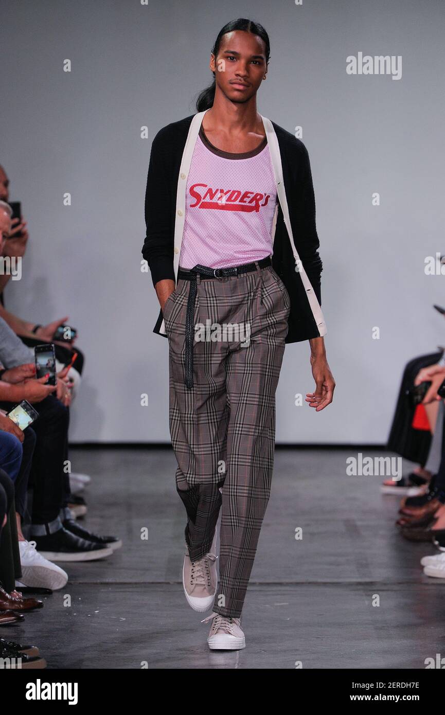Model walks on the runway during the Todd Snyder Fashion Show during ...