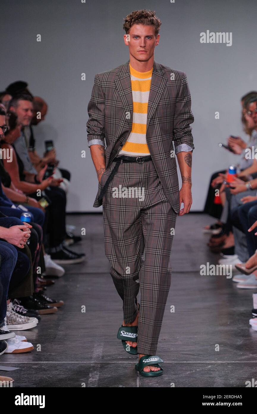 Model walks on the runway during the Todd Snyder Fashion Show during ...