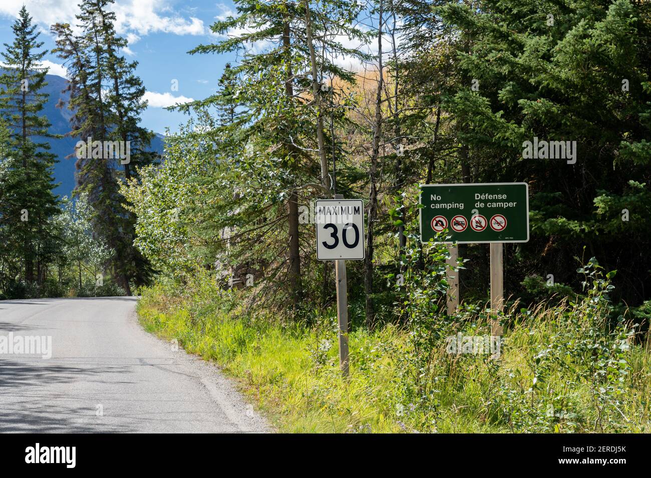 Maximum 30 km speed limit sign at Vermilion Lakes road in summer season ...