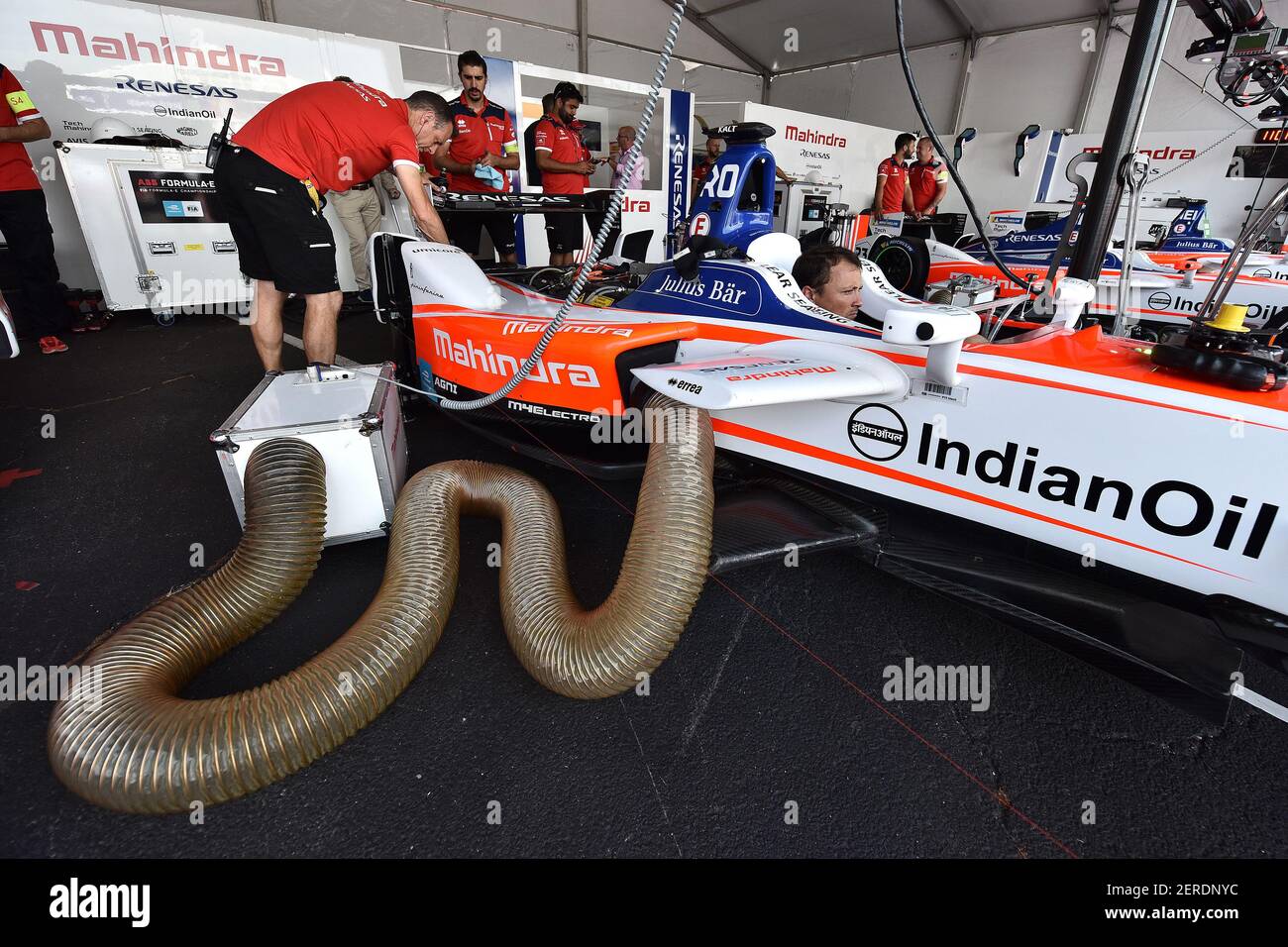 Mahindra Racing team mechanics work on an E racing car during Race Day ...