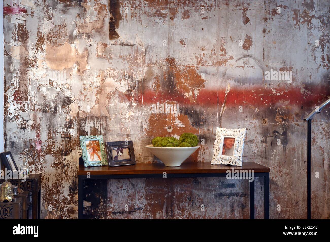 An exposed wall shows off the age, color and texture of the space in ...