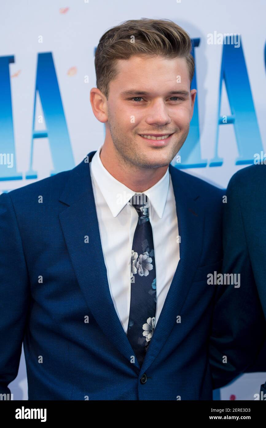 Jeremy Irvine on the red carpet during the premiere of movie Mamma Mia ...