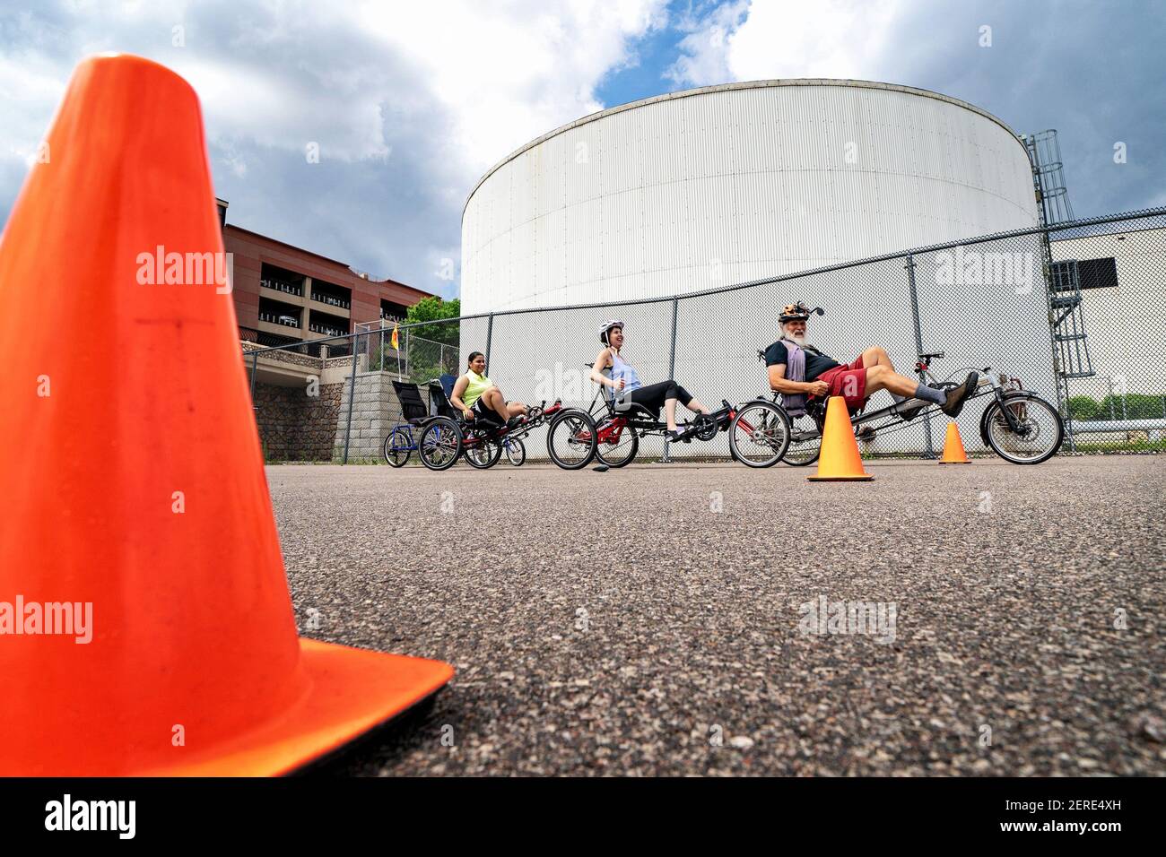 Volunteer Dale Hammerschmidt leads the triple seater with clients ...