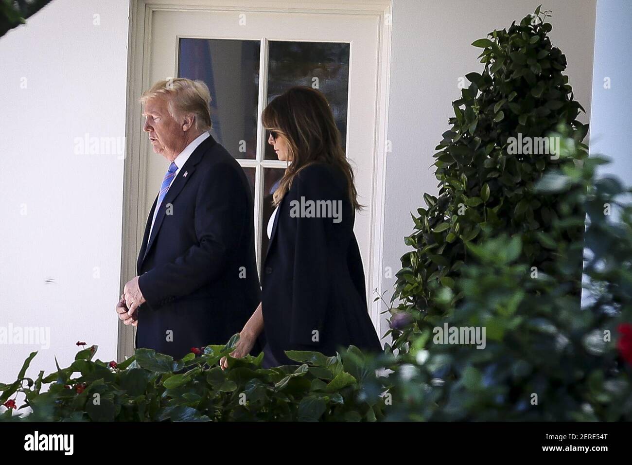 President Donald Trump and First Lady exits the Oval Office as they ...